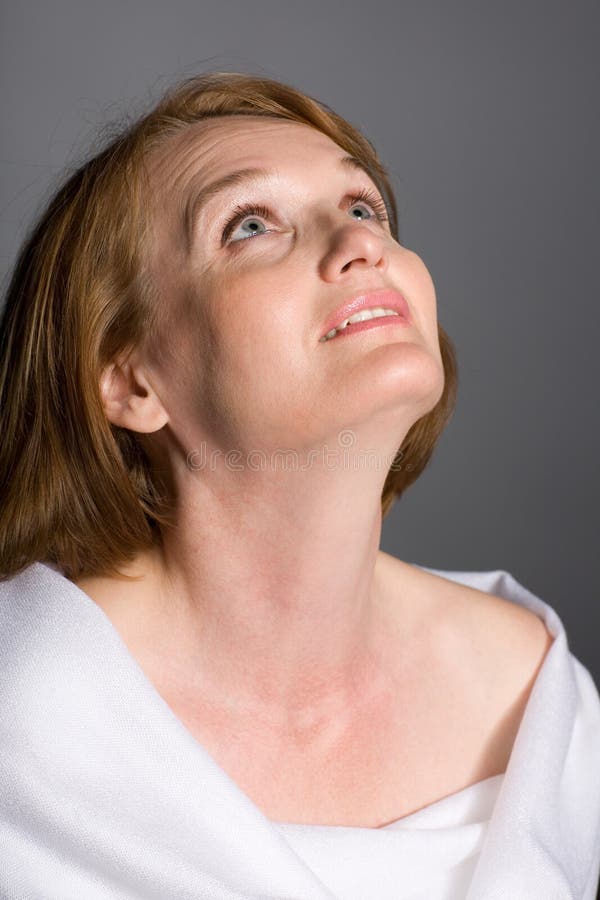 Beautiful woman looking up stock image. Image of closeup - 20081627