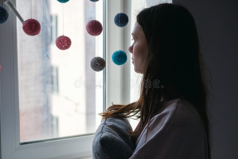 Beautiful Woman Looking through a Window Stock Photo - Image of ...