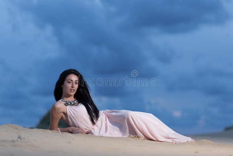 Beautiful Woman Lying on a Sand Dune Stock Image - Image of lady ...