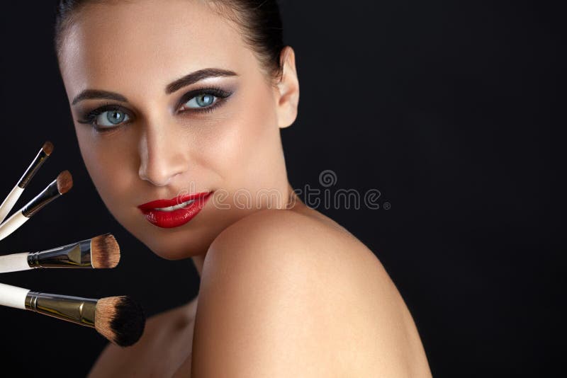 Beautiful Woman with Makeup Brushes. Makeup Stock Photo - Image of ...