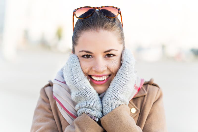 Beautiful woman in mittens stock photo. Image of cheerful - 49473682