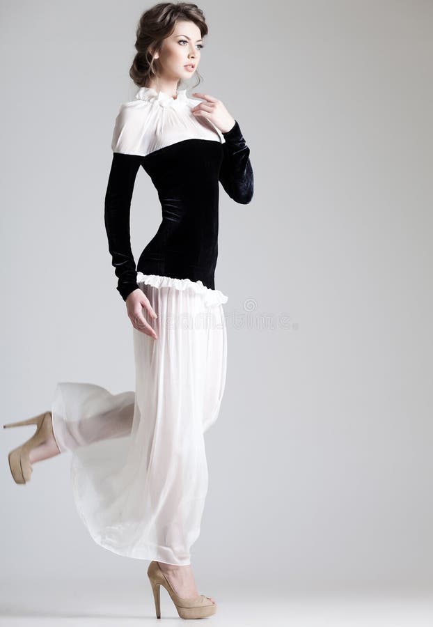 Beautiful Woman Model Posing in Elegant Dress in the Studio Stock Image ...