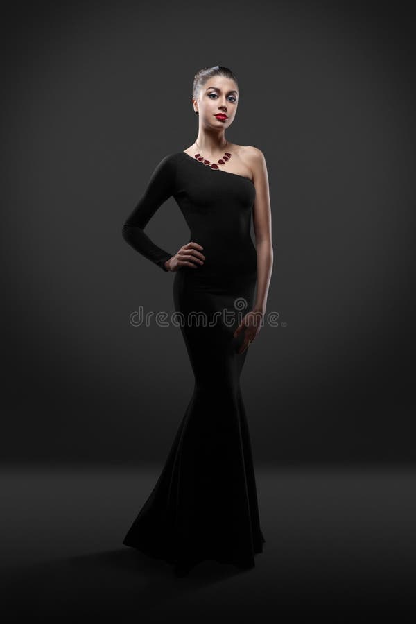 Beautiful Woman Model Posing in Elegant Dress in the Studio Stock Image ...