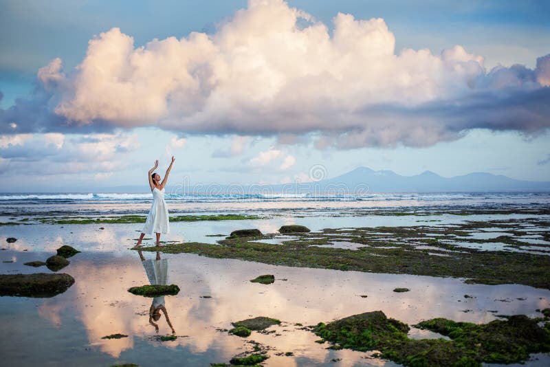 Beautiful Woman by the Ocean at Sunset Stock Photo - Image of ocean ...