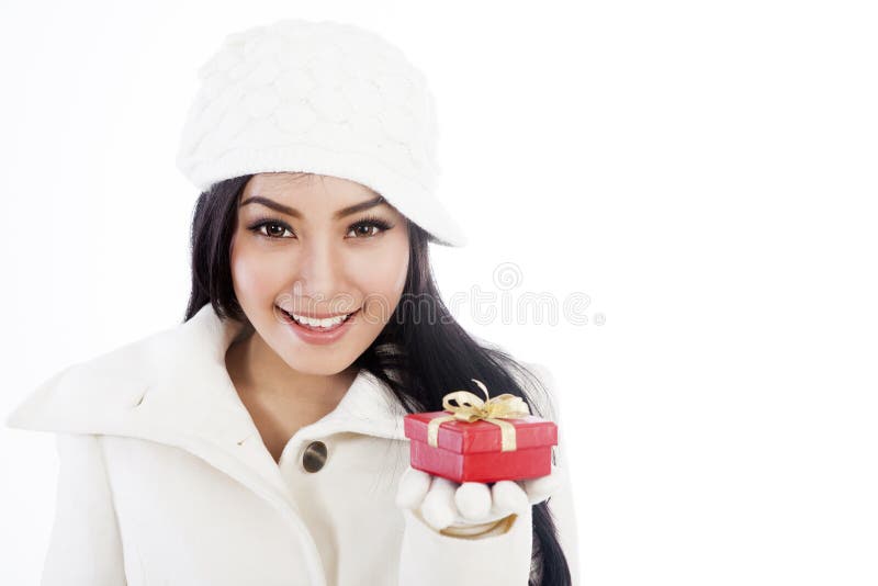 Beautiful Woman Offering a Christmas Gift Stock Photo - Image of face ...