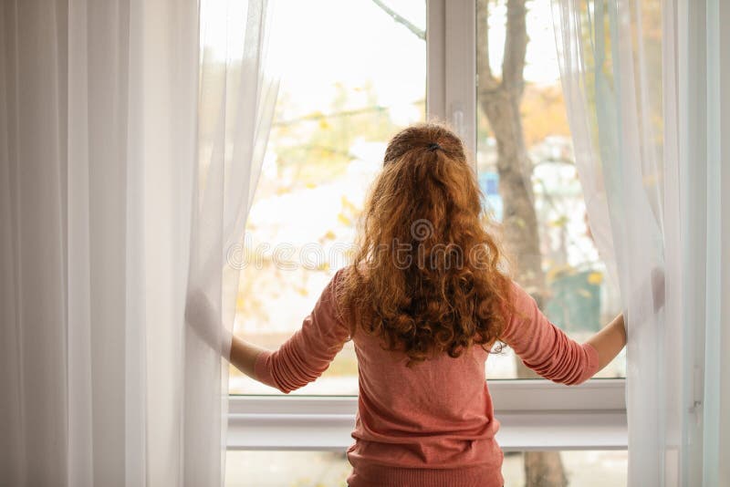 Woman Opening Curtains Stock Photos - Download 689 Royalty Free Photos