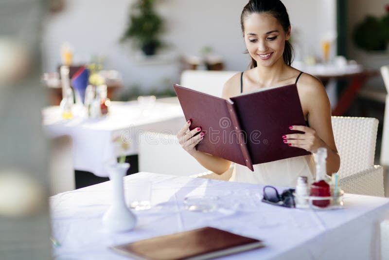 Beautiful Woman Ordering from Menu Stock Image - Image of food, lunch ...