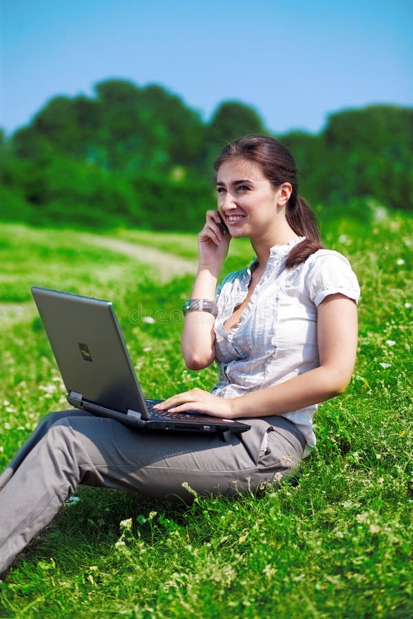 Beautiful Woman with Phone and Notebook on Grass Stock Image - Image of ...