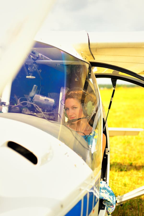 Beautiful Woman the Pilot in a Cockpit of the Ultralight Plane Stock ...