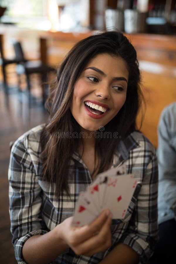 Beautiful Woman Playing Cards in Bar Stock Image - Image of adult ...