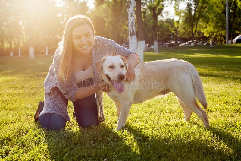 Beautiful Woman with Her Dog. Labrador Retriever Stock Photo - Image of ...