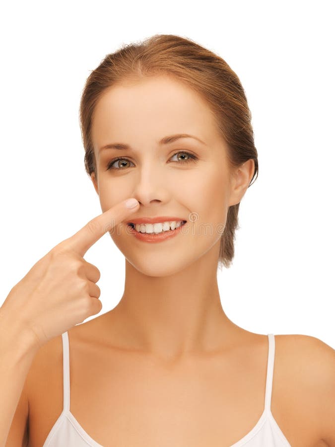 Beautiful Woman Pointing To Nose Stock Photo - Image of lovely, nose ...