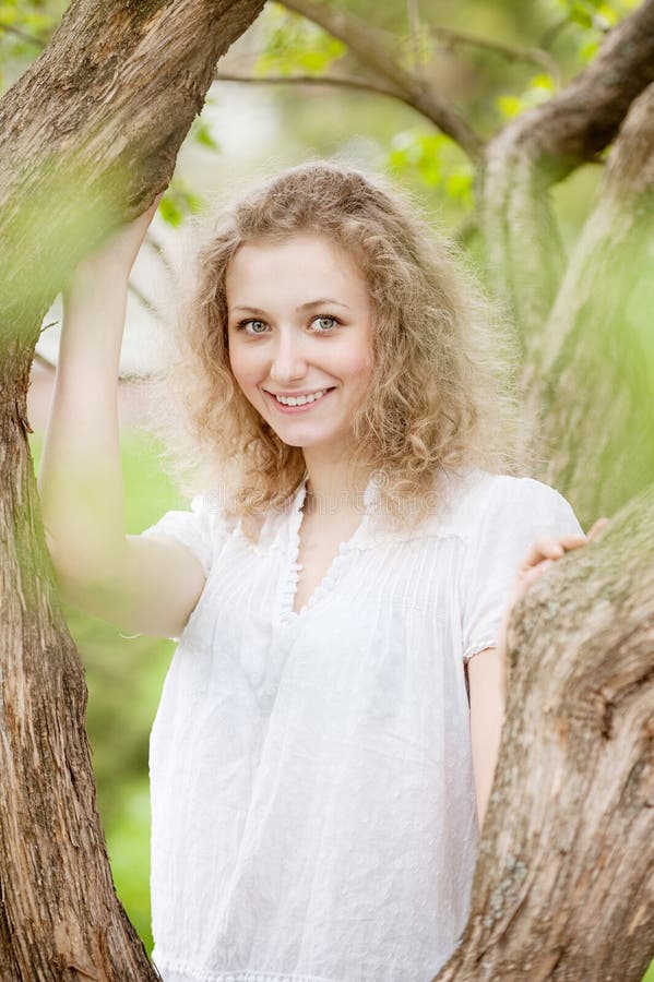 Beautiful Woman Posing Near the Tree Stock Image - Image of caucasian ...