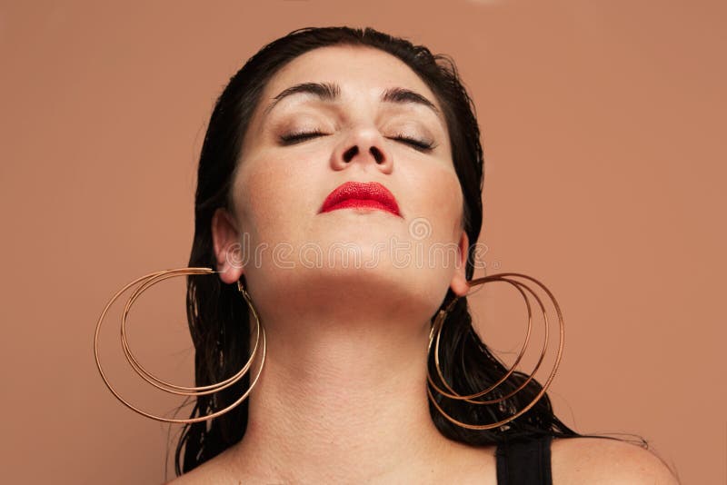 Beautiful Woman Posing on the Studio Background. Close-up Portrait ...