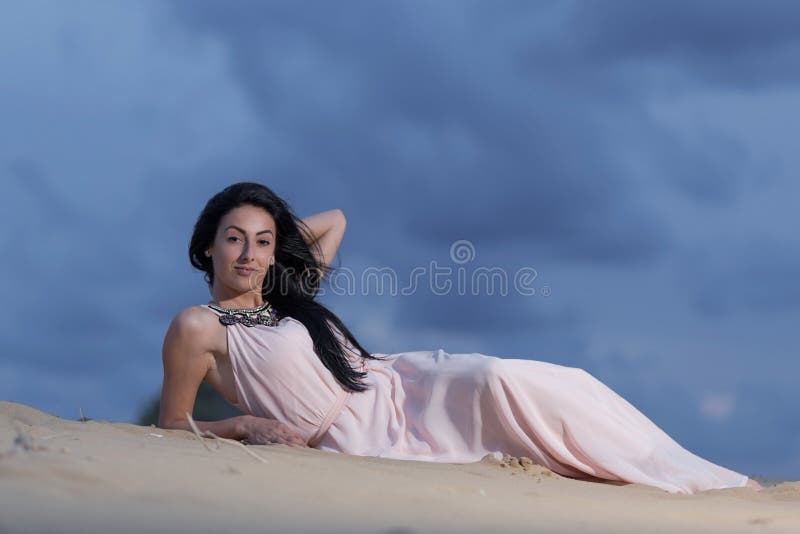 Beautiful Woman Posing on a Sand Dune Stock Image - Image of beautiful ...