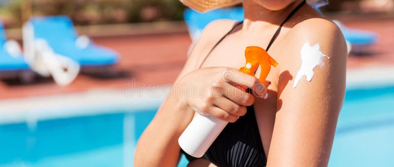 Beautiful Woman Protecting Her Skin Against Sunburn Applying Sun