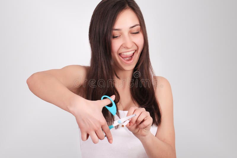 Beautiful Woman Quitting Smoking Cigarettes. Stop Smoking Stock Photo ...