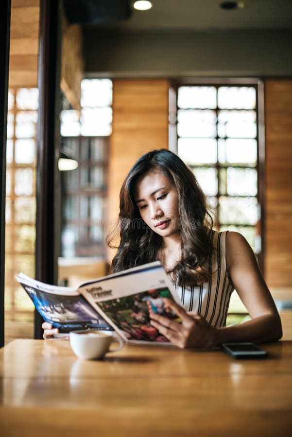 Beautiful Woman Reading Magazine Stock Photo - Image of beautiful ...