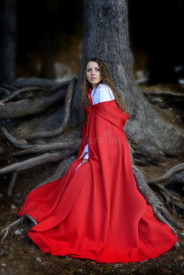 Beautiful Woman with Red Cloak Stock Photo - Image of lonely, caucasian ...