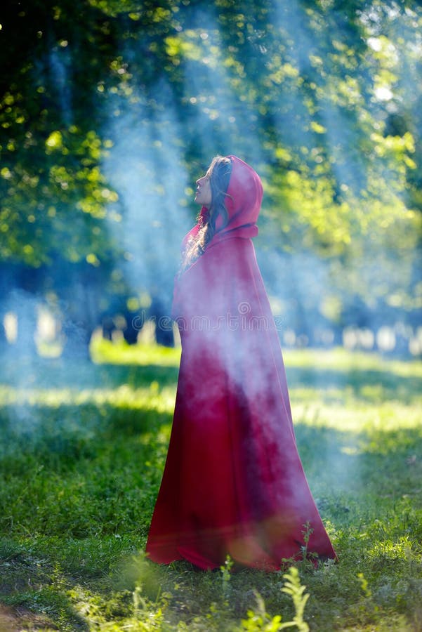 Beautiful Woman with Red Cloak in the Woods Stock Photo - Image of cold ...