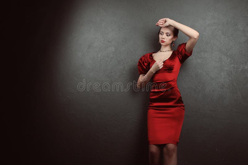 Beautiful Woman in Red Dress with Professional Make Up Stock Photo ...