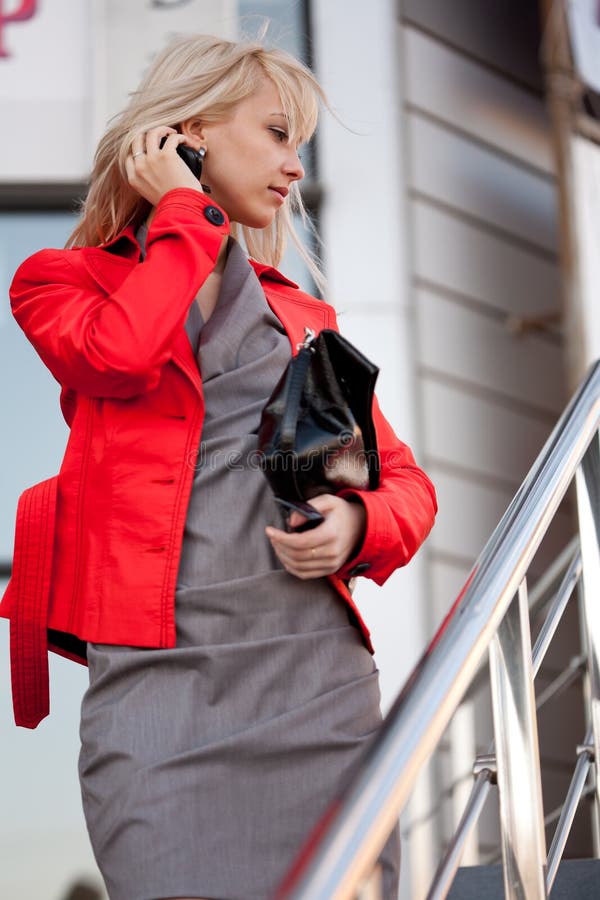 Beautiful Woman in Red Jacket Stock Photo - Image of blond, beautiful ...