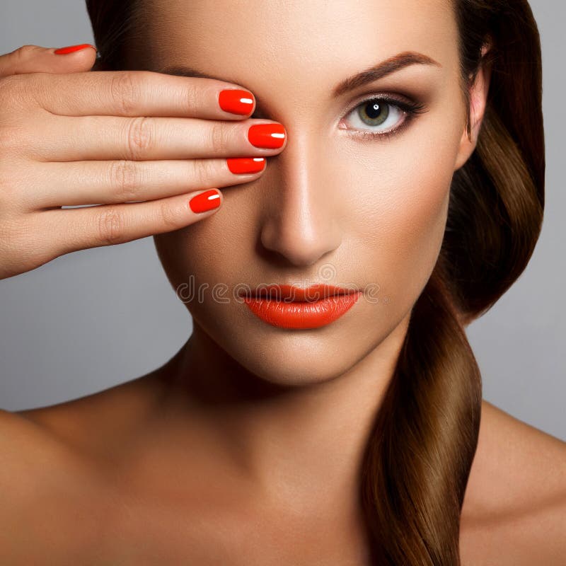 Beautiful Woman with Red Nails. Makeup and Manicure Stock Photo - Image ...