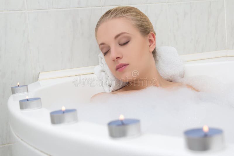 Beautiful Woman Relaxing in Bath with Candles Stock Photo - Image of ...
