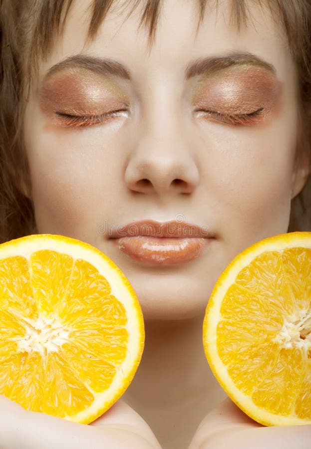 Beautiful Woman`s Face with Orange Stock Photo - Image of desire ...