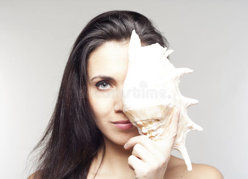 Beautiful Woman with Sea-shell Stock Photo - Image of girl, harmony ...