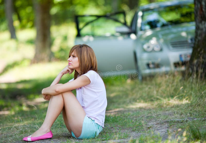 Beautiful woman sitting stock photo. Image of casual - 15297934