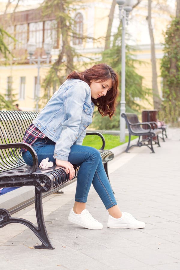 Beautiful Woman Sitting on a Bench Stock Image - Image of bright, girl ...