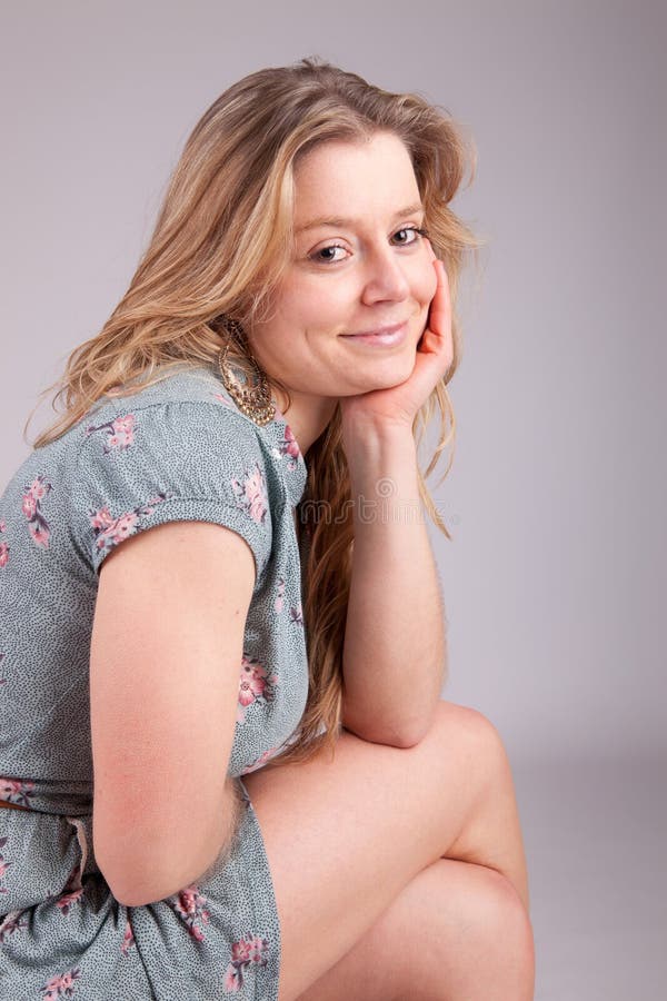 Beautiful Woman Sitting on a Chair Stock Photo - Image of lovely ...