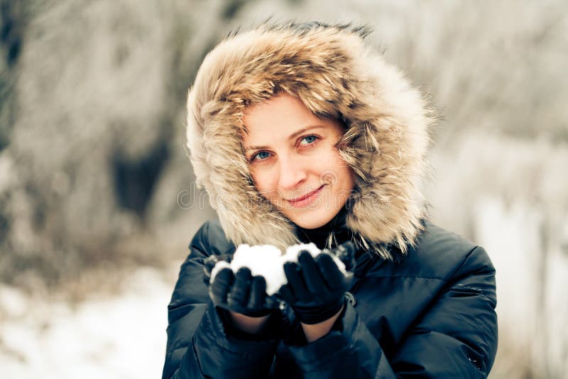 Beautiful Woman with Snow in Her Hands Stock Photo - Image of seasonal ...