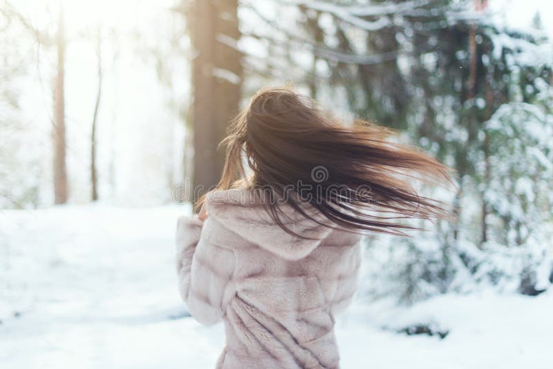 Beautiful Woman on Snowing Cold Winter Day in Forest. Stock Image ...