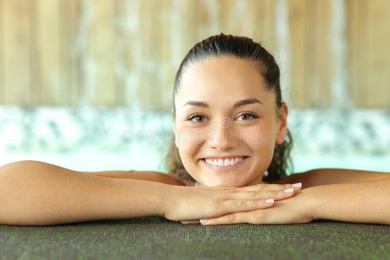 Beautiful Woman in Spa Looking at Camera Stock Photo - Image of ...