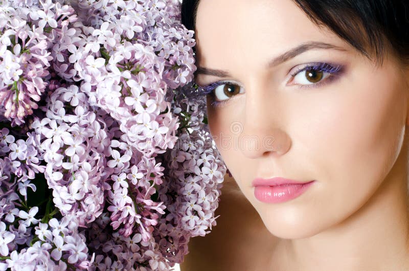 Beautiful Woman with Spring Flowers of a Lilac Stock Photo - Image of ...