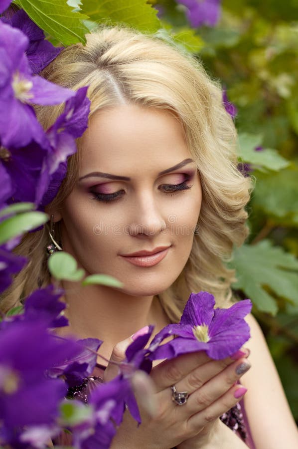 Beautiful Woman in Spring Garden Stock Photo - Image of grass, glamour ...