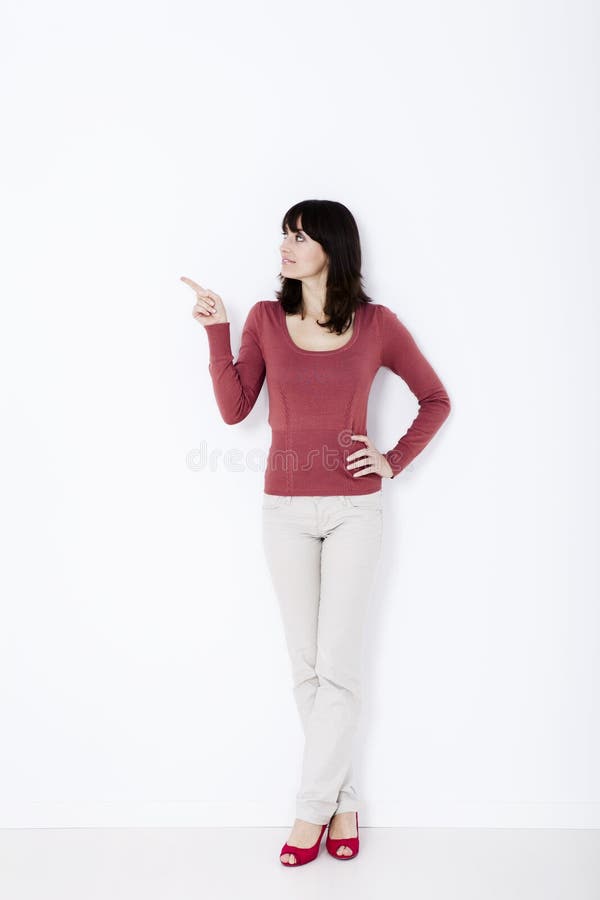 Beautiful Woman Standing and Pointing Stock Image - Image of beautiful ...