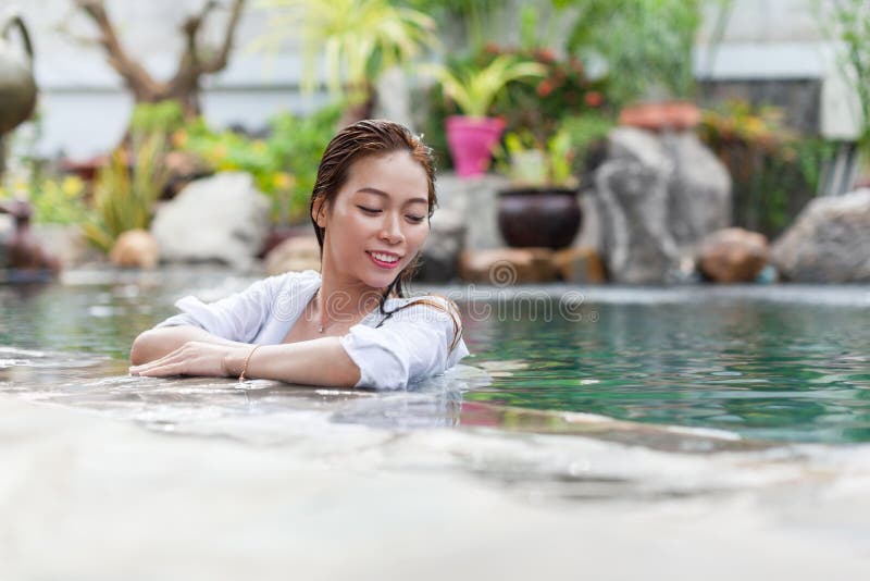 Beautiful Woman Swimming Pool At Resort Relaxed Portrait Young Asian