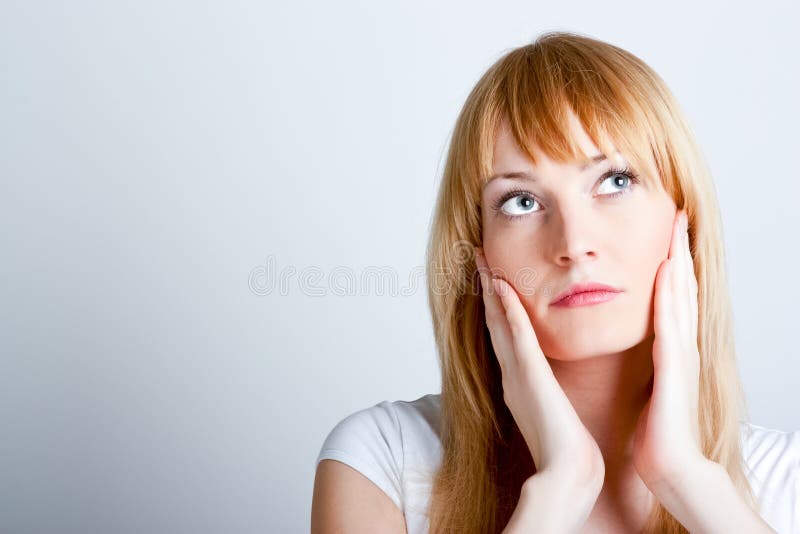 Beautiful woman thinking stock photo. Image of face, eyes - 22476054