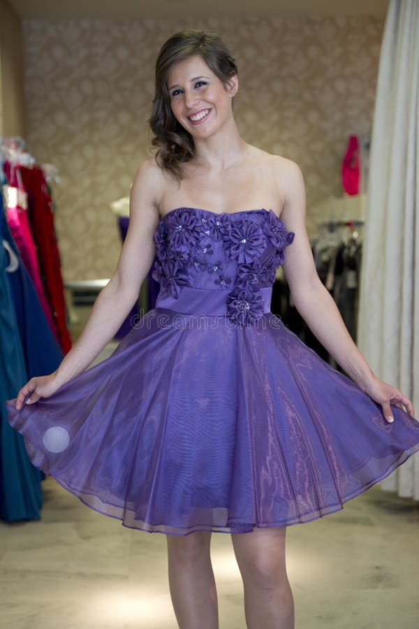 Beautiful Woman Try on a Dress Stock Photo - Image of mirror, people ...