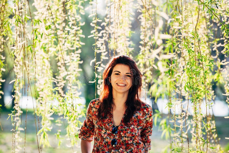 Beautiful Woman Under Tree Branches Stock Photo - Image of grass, park ...