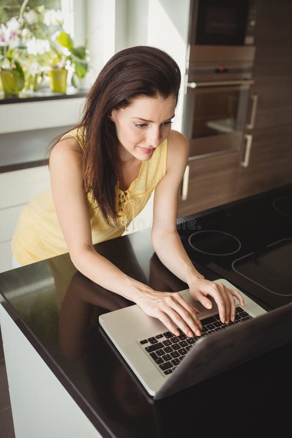 Beautiful Woman Using Laptop Stock Image - Image of kitchen, laptop ...