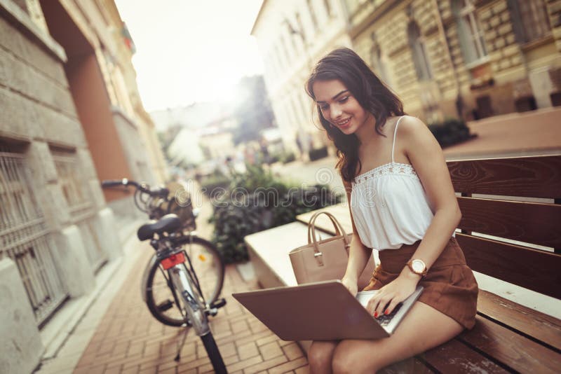 Beautiful Woman Using Laptop Outdoors Stock Photo - Image of happiness ...