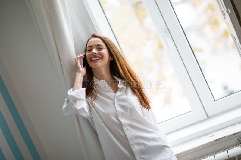 Beautiful Woman Using Phone in House Stock Photo - Image of mobile ...