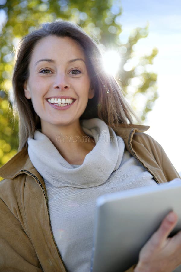 Beautiful Woman Using Tablet Outdoors Stock Image - Image of camera ...