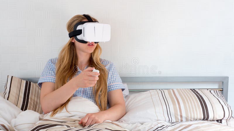 Beautiful Woman Using VR Headset in Bed Stock Photo - Image of feminine ...