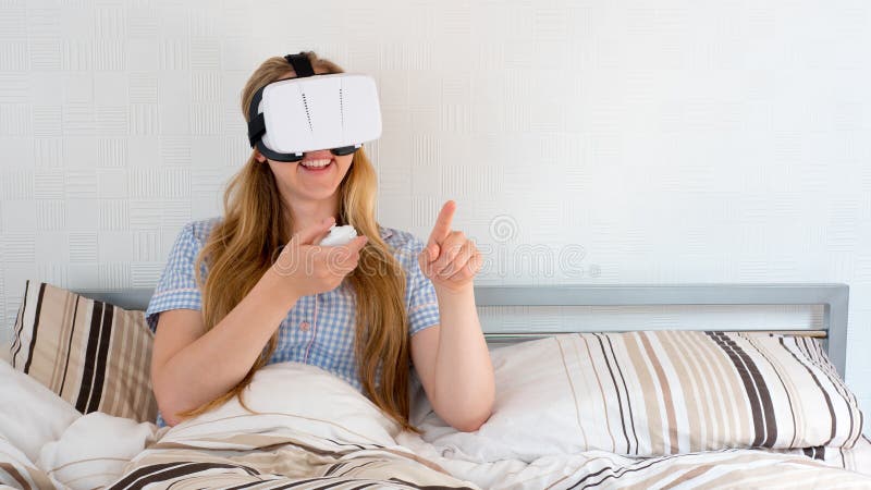 Beautiful Woman Using VR Headset in Bed Stock Photo - Image of female ...