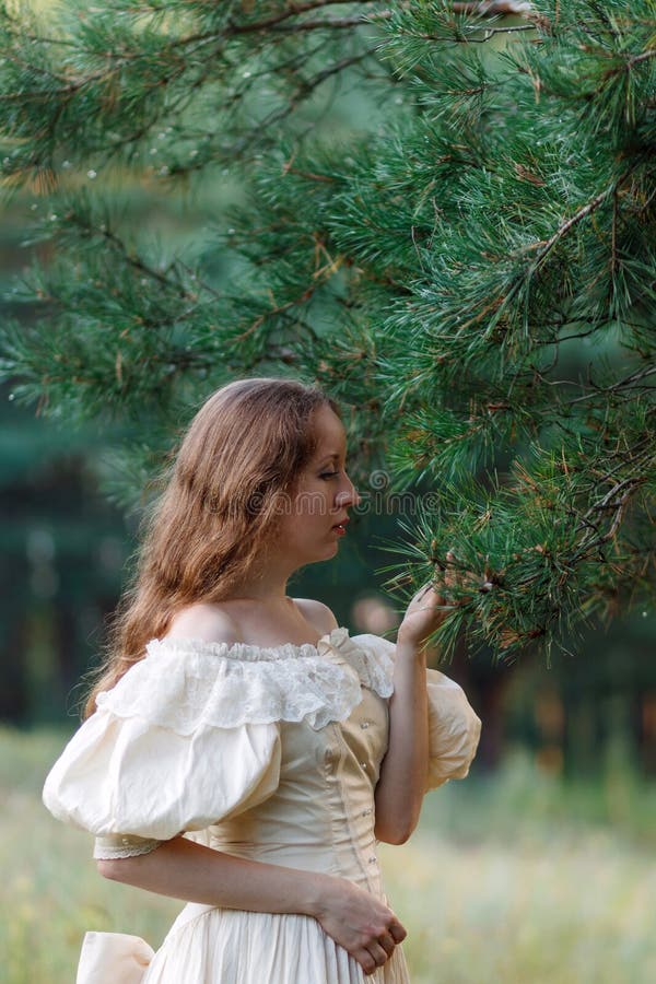 Beautiful Woman In Vintage Dress Beige Cute Girl In Long Dress Walking